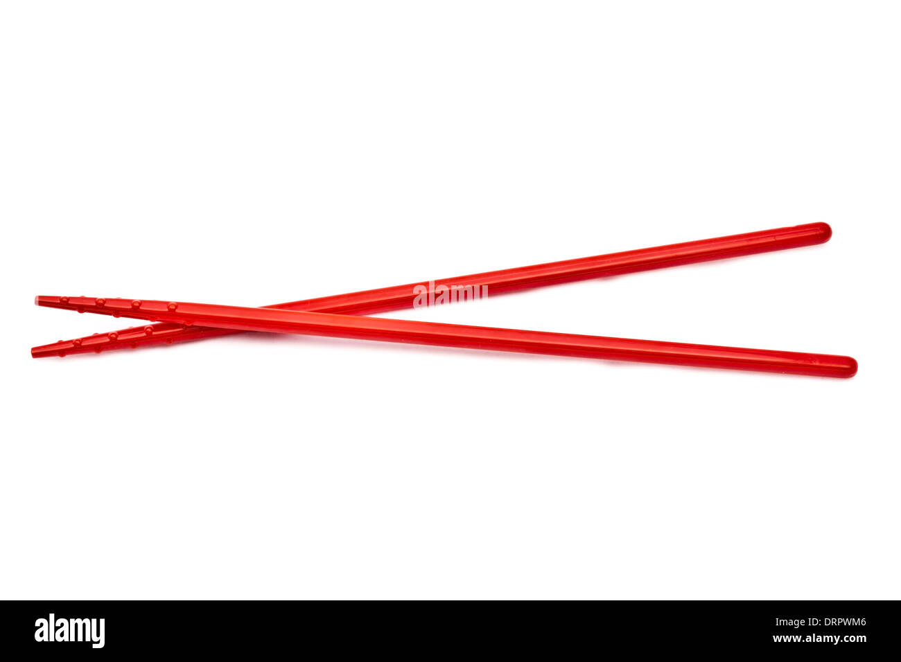 Red chopsticks isolated on white background Stock Photo - Alamy