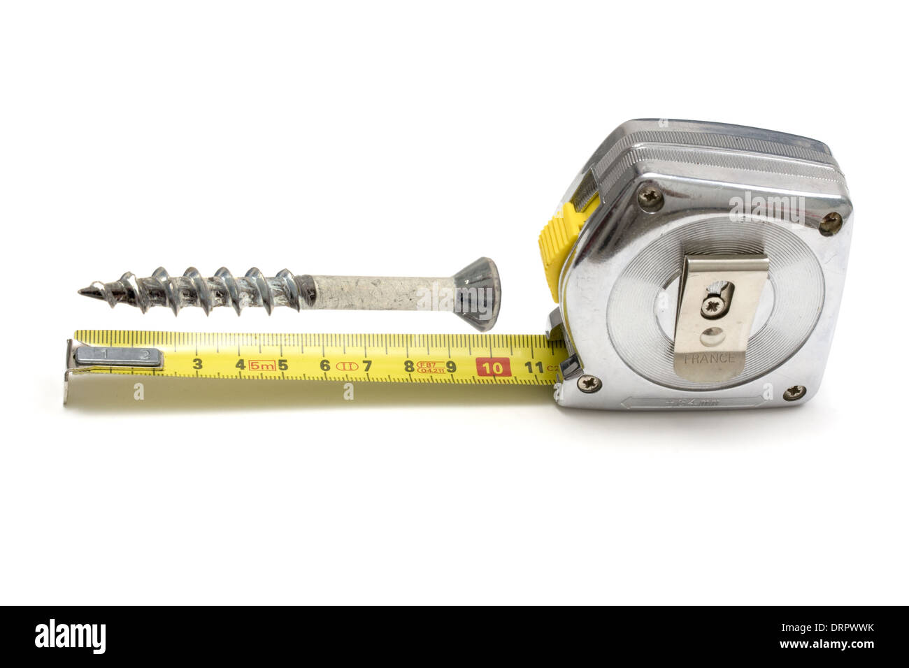 Tape measure and a screw Stock Photo - Alamy