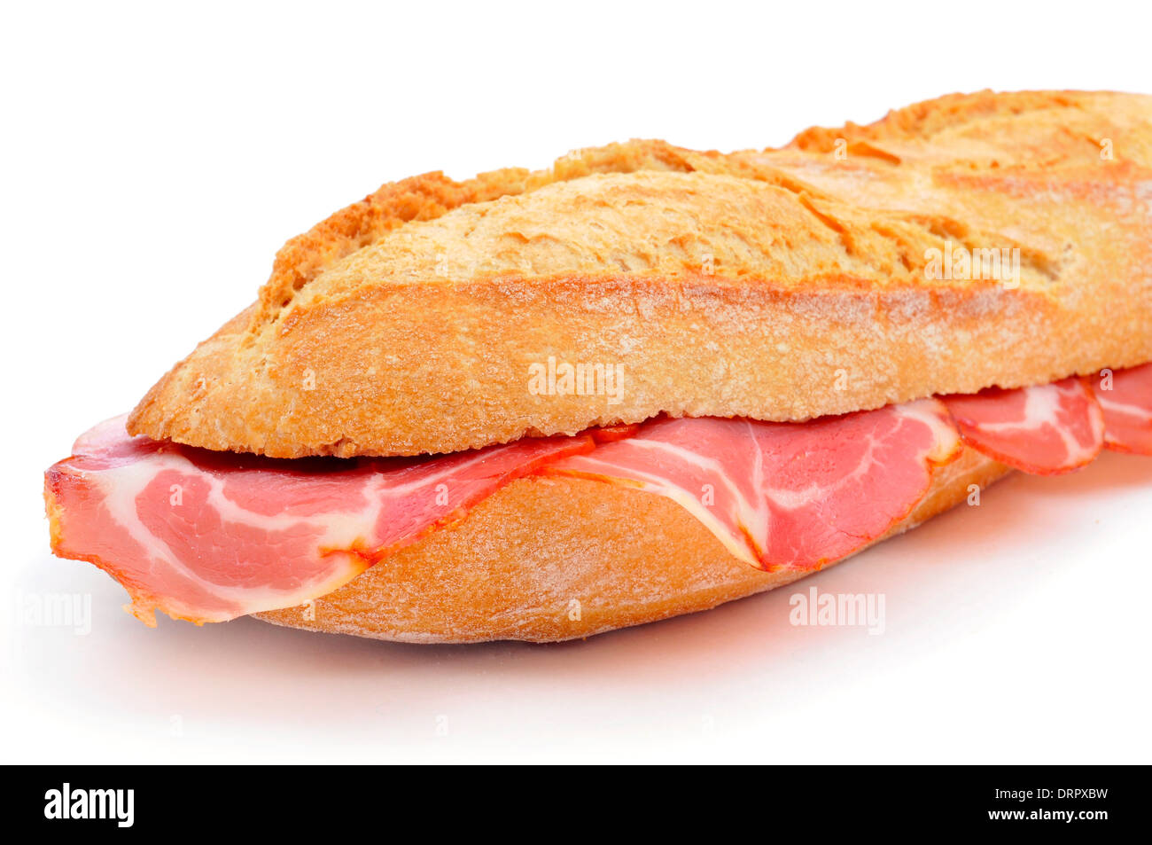 closeup of a spanish bocadillo de lomo embuchado, a sandwich with cold ...