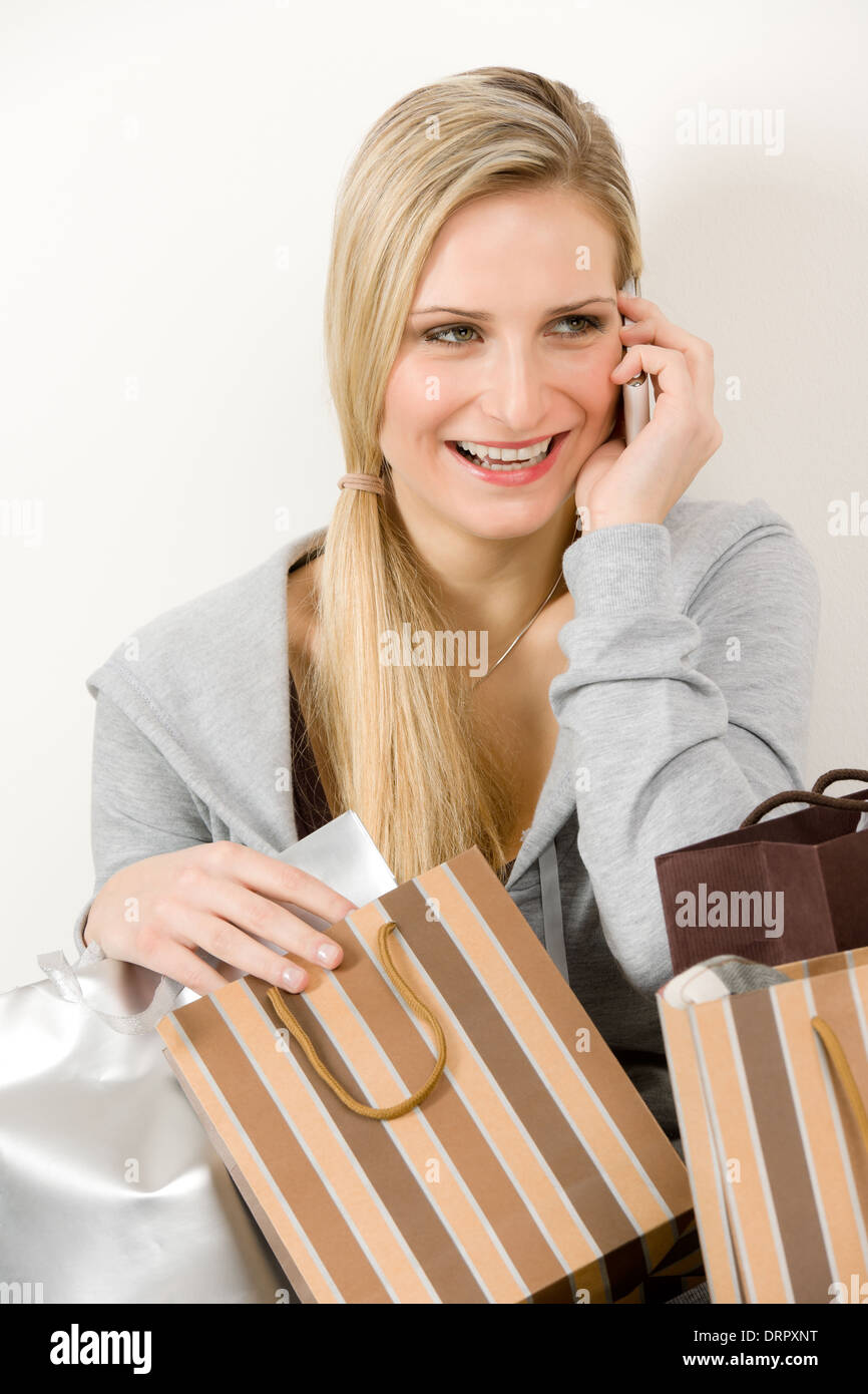 Shopping woman fashion bag phone call Stock Photo - Alamy