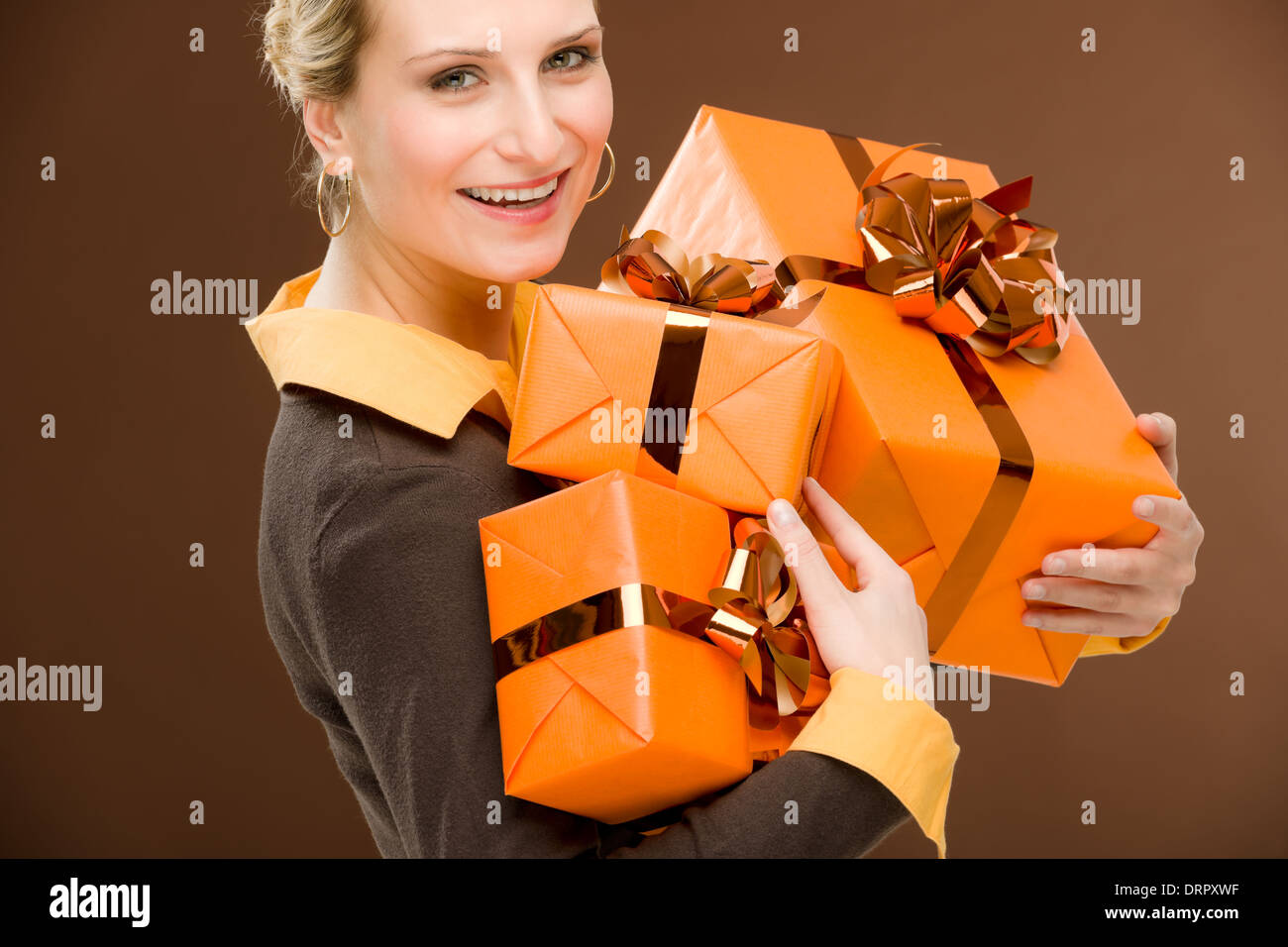 Present woman celebration hold happy Stock Photo - Alamy
