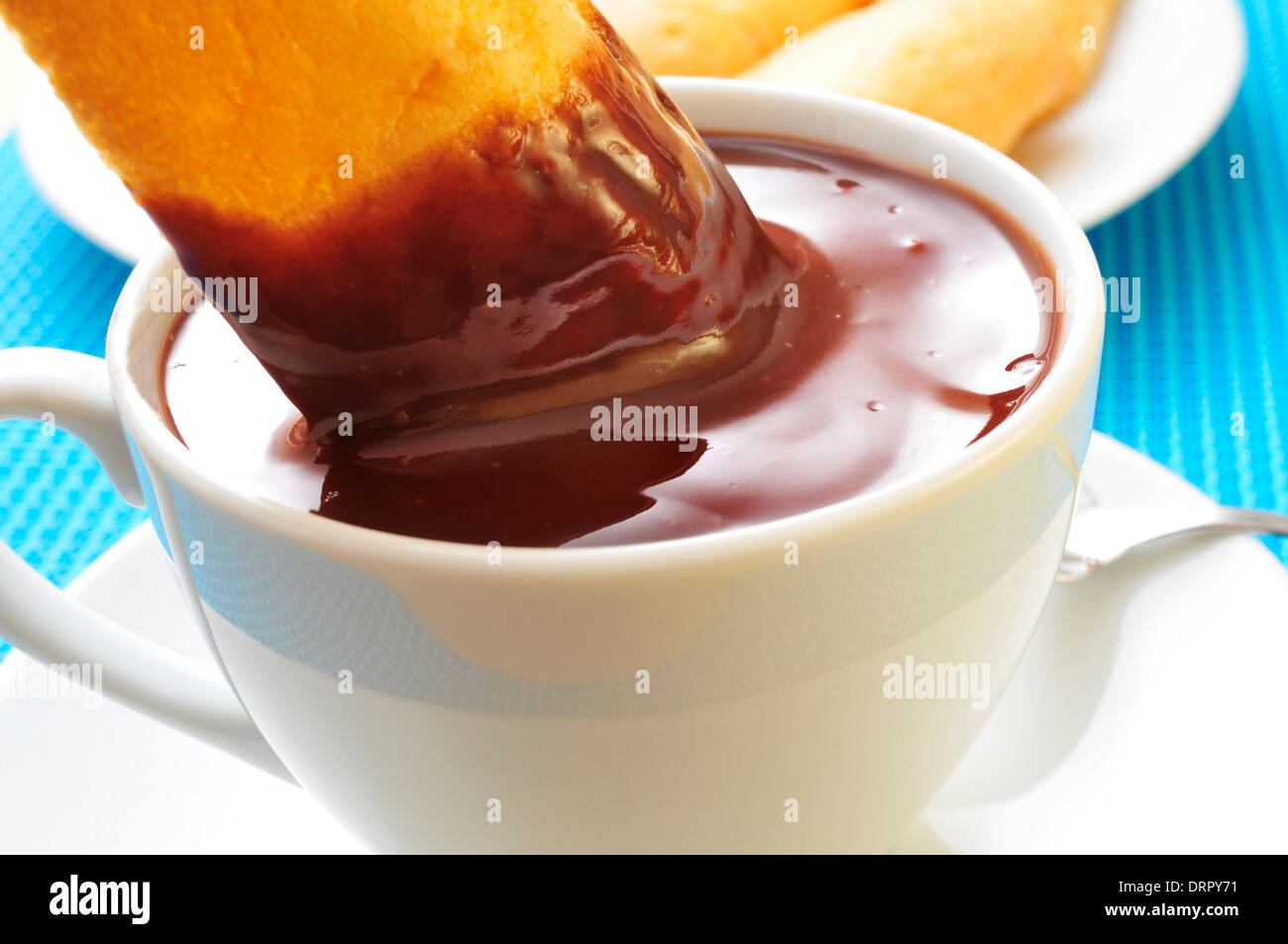 closeup of a cup of xocolata i melindros, hot chocolate with typical ...