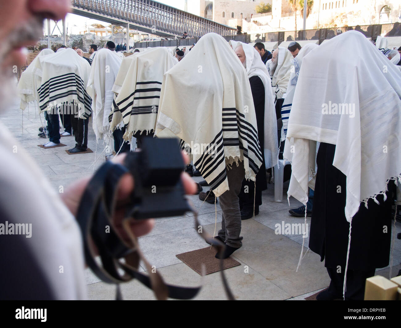 Jerusalem, Israel. 31st January 2014. A man holding Tefillin ...