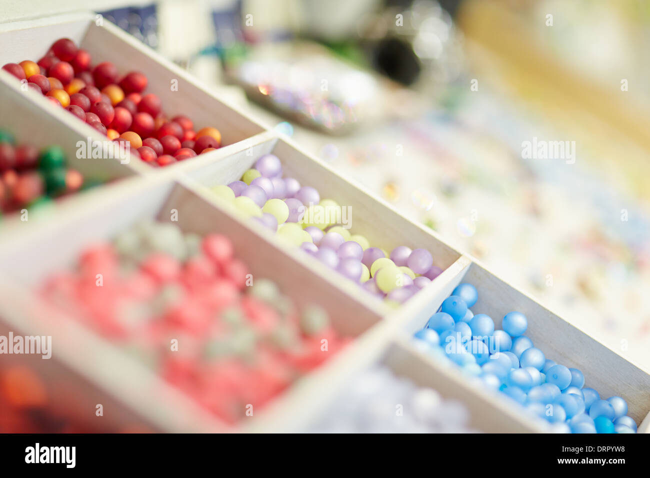 Colorful pearls selection for jewelry in a boutique Stock Photo - Alamy