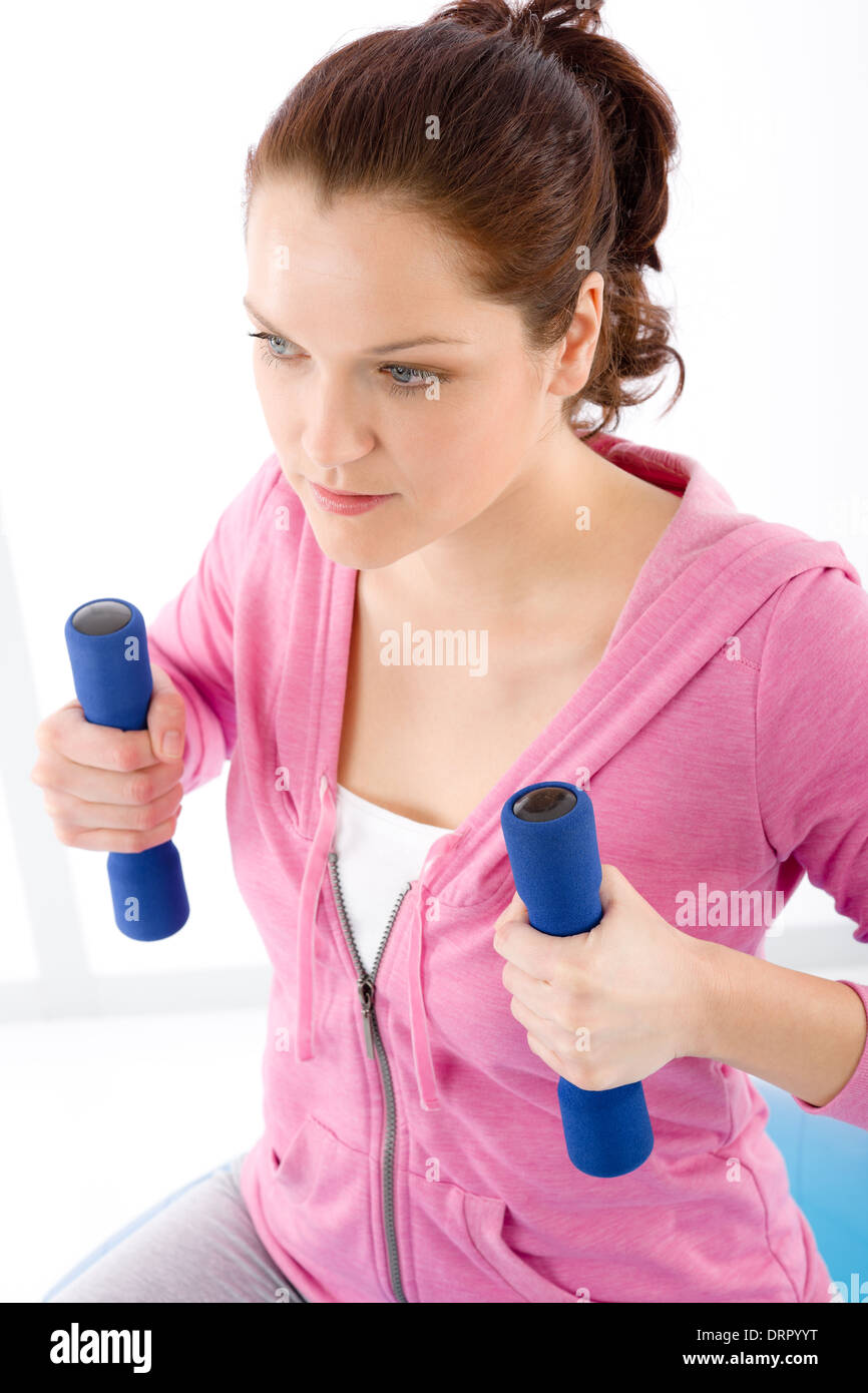 Fitness happy woman exercise dumbbell gym Stock Photo - Alamy