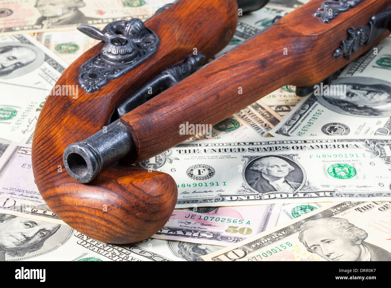 Dollar weapon hi-res stock photography and images - Alamy