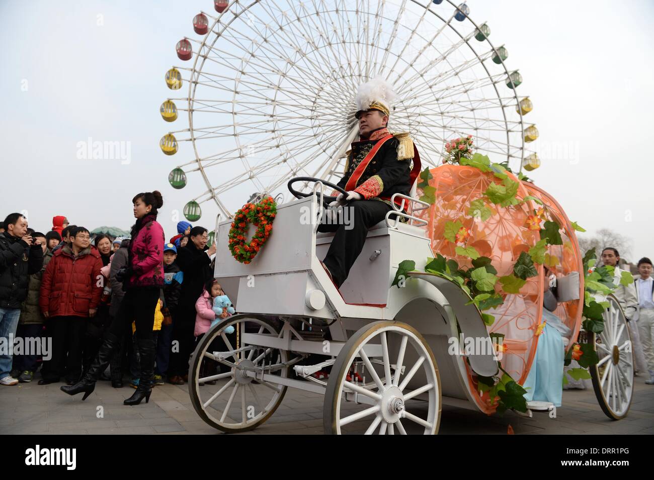 Beijing, China. 31st Jan, 2014. Performers take part in a parade during ...