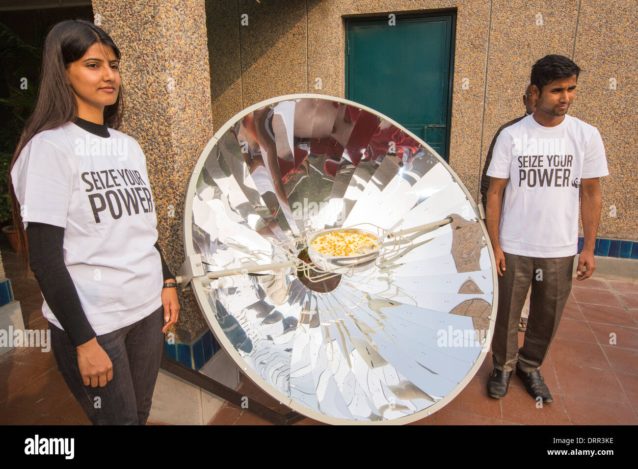 A solar cooker being used to cook food at the offices of WWF India, in ...