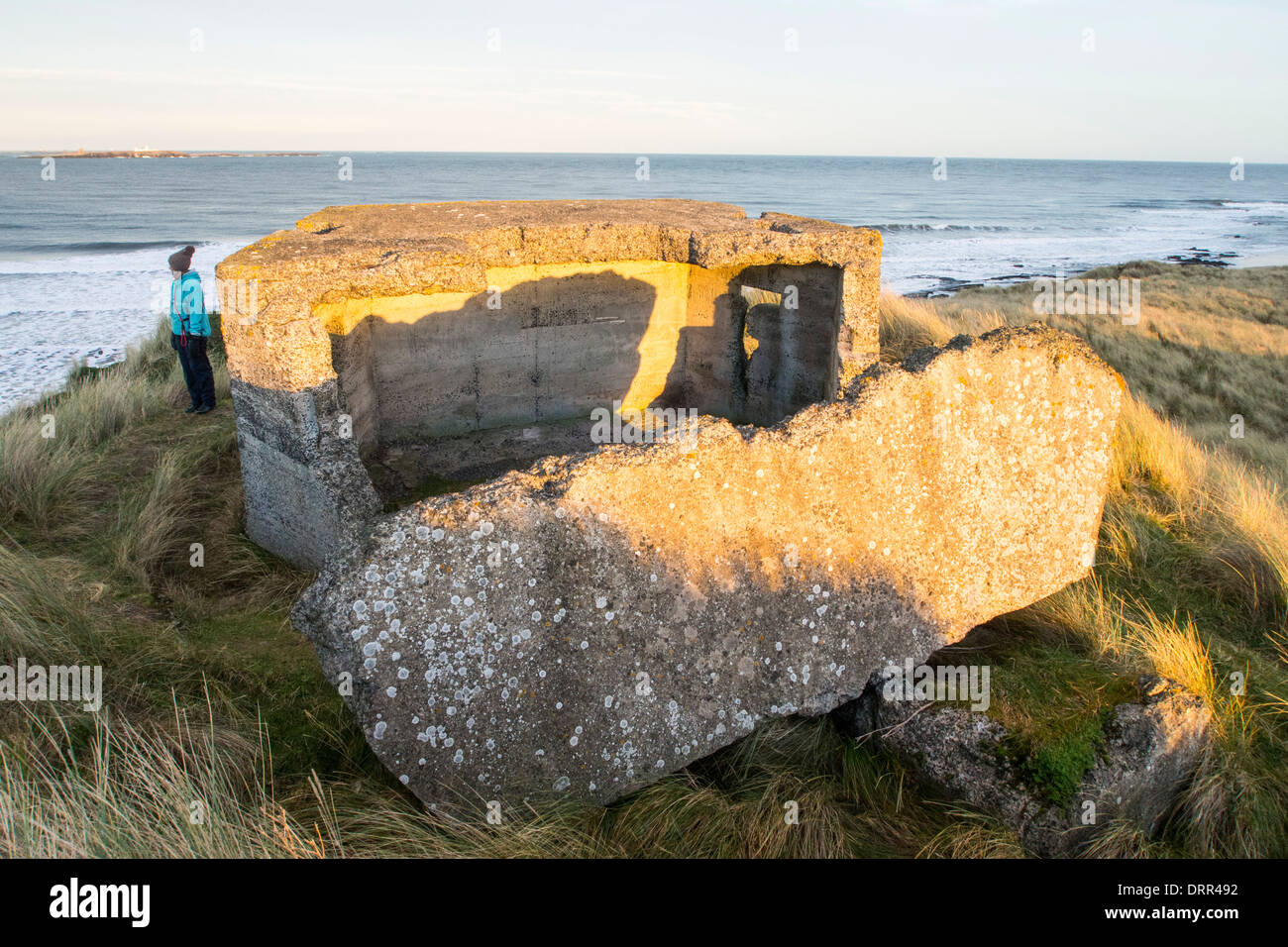 An old second world war pill box in the sand dunes near Seahouses ...
