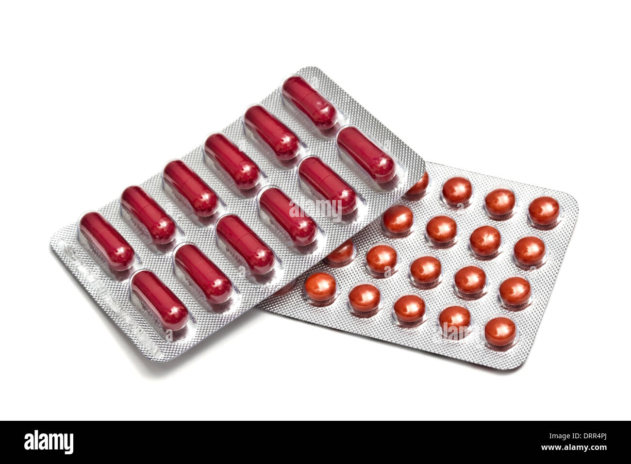 Red pink colored capsules hi-res stock photography and images - Alamy