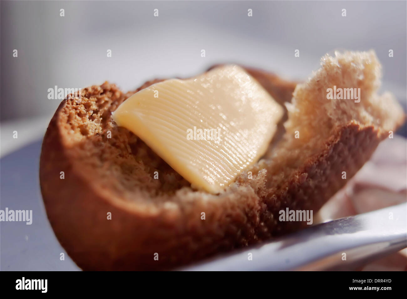 Brown bread slice butter close hi-res stock photography and images - Alamy