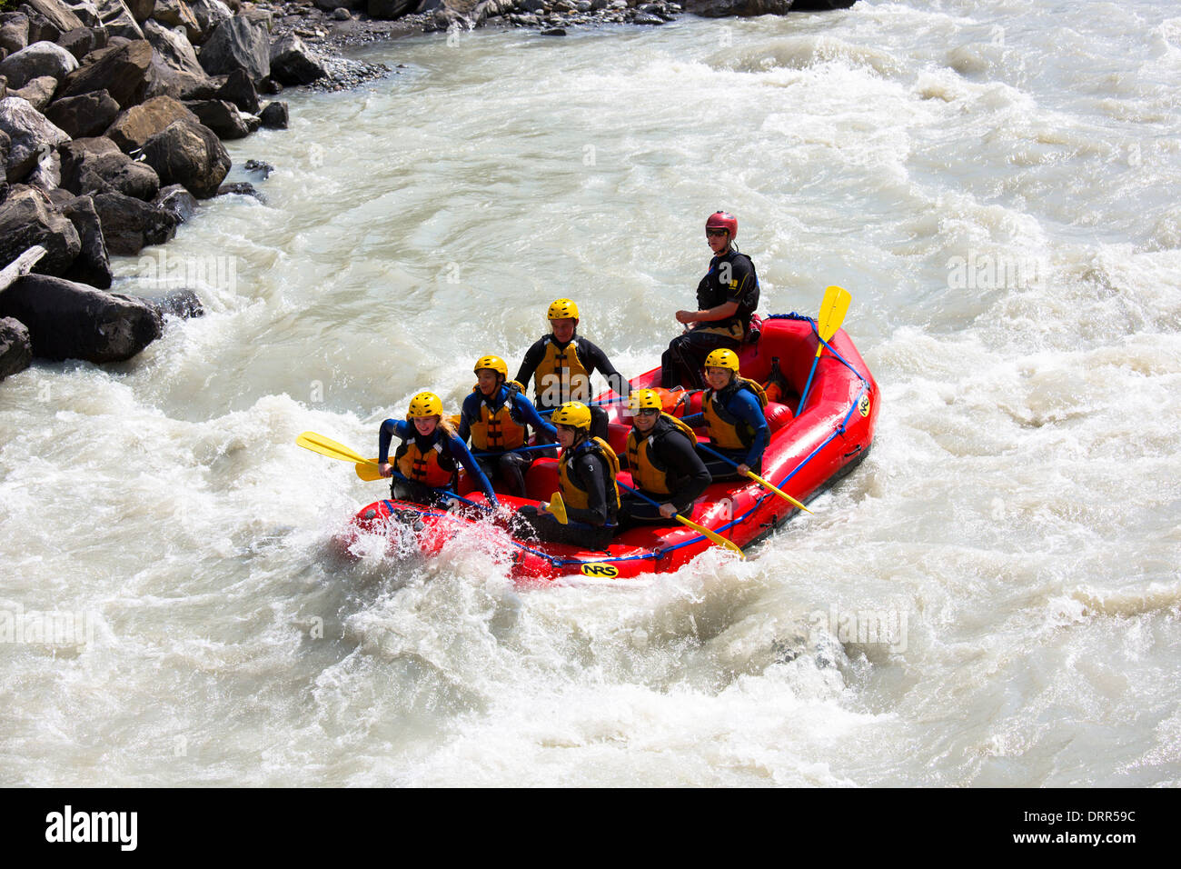 Tourists white water rafting towards Interlaken in the Bernese Oberland ...