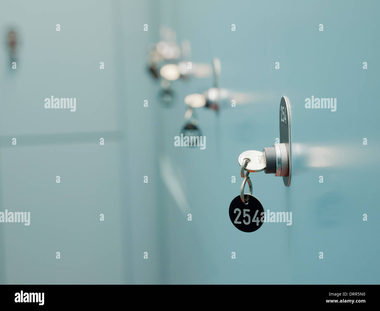 Many lockers with keys on locker room Stock Photo - Alamy