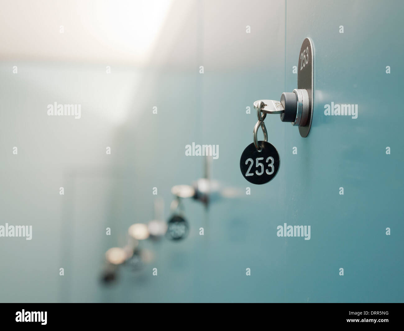 Many lockers with keys on locker room Stock Photo - Alamy