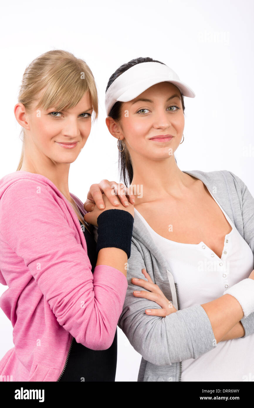 Two sport woman friends smiling Stock Photo - Alamy