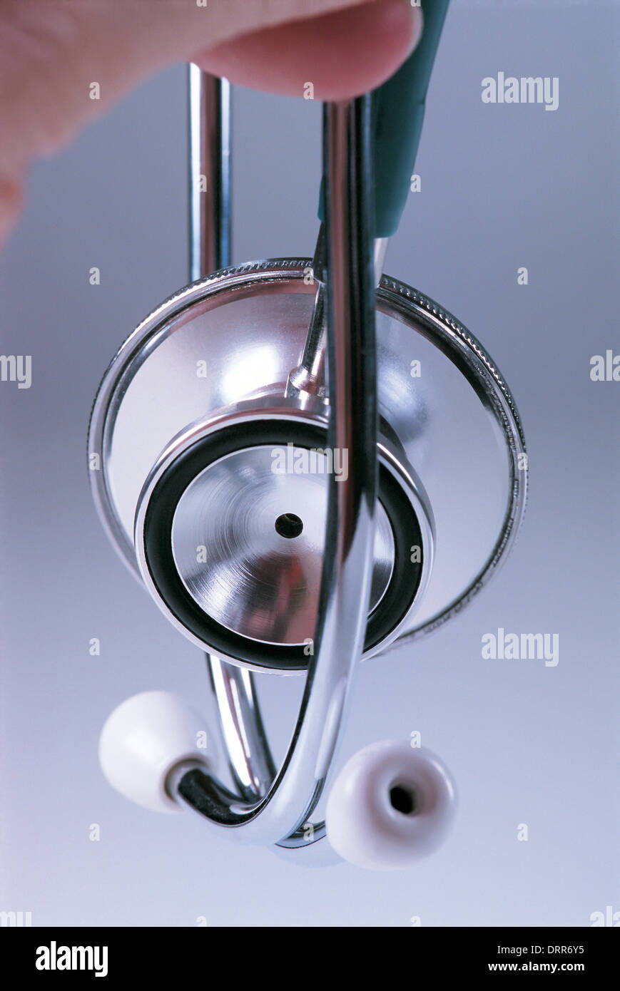 Hand holding stethoscope, close-up Stock Photo - Alamy