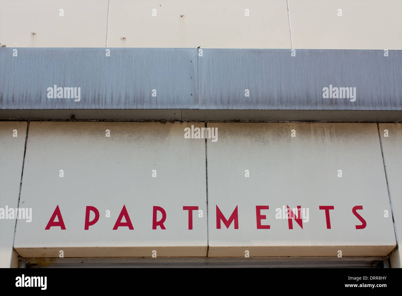 Sign to an apartment building Stock Photo - Alamy