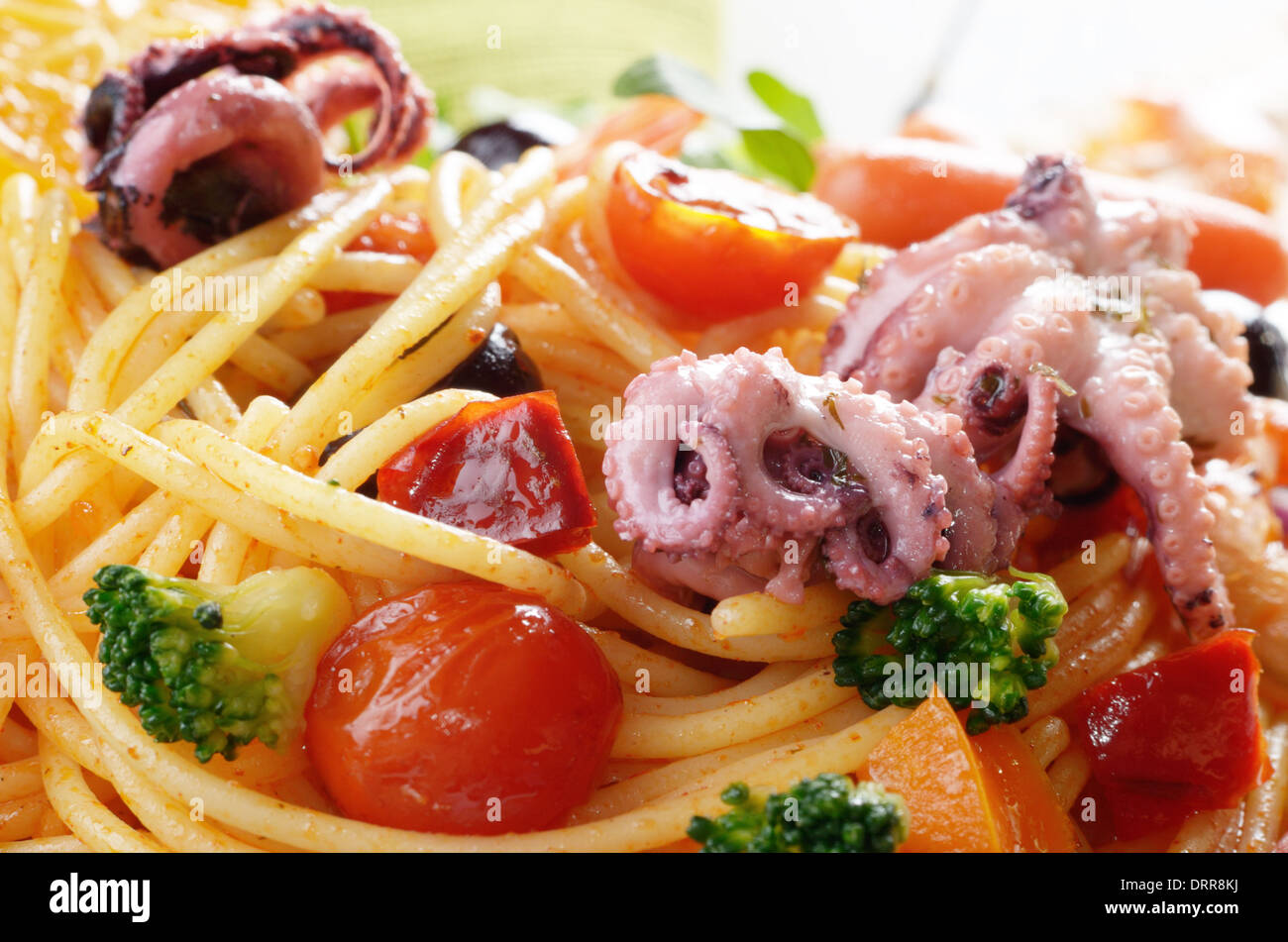 Seafood spaghetti marinara pasta with octopus, shrimps, cherry tomatoes ...