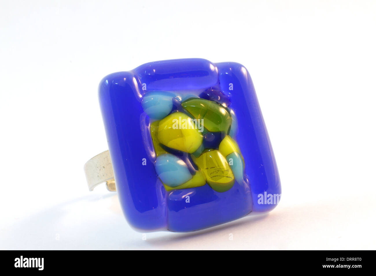 origina blue glass handmade ring on white background Stock Photo - Alamy