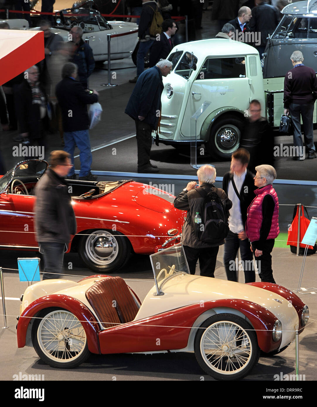 Bremen, Germany. 31st Jan, 2014. Visitors look at a Champion CH2 with ...