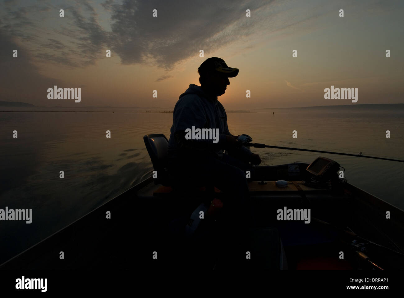 Fisherman casting from boat hi-res stock photography and images - Alamy