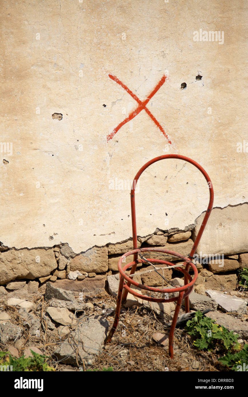 Broken chair with X Stock Photo - Alamy