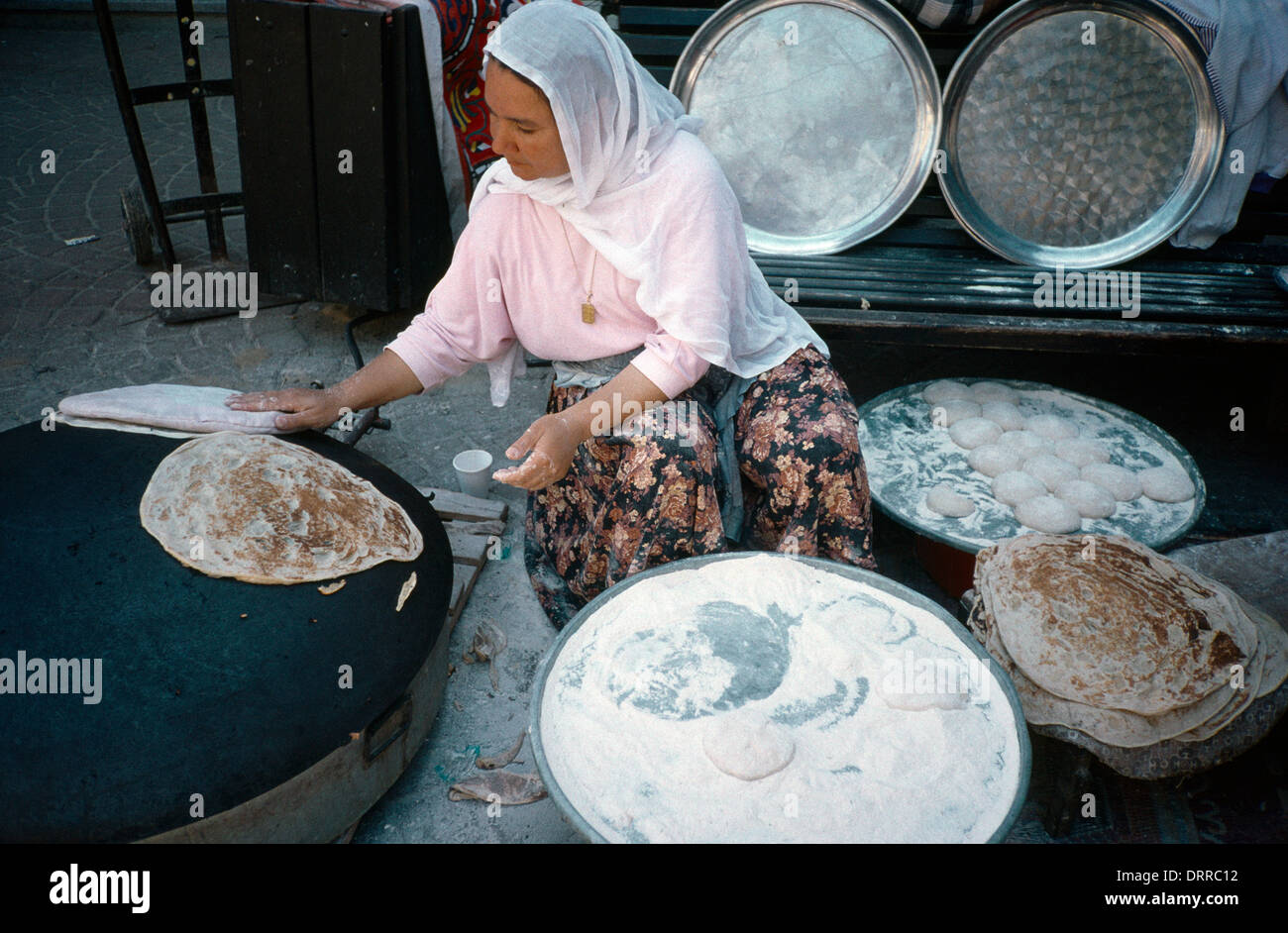 Israel Woman Making Pitta Bread Stock Photo - Alamy