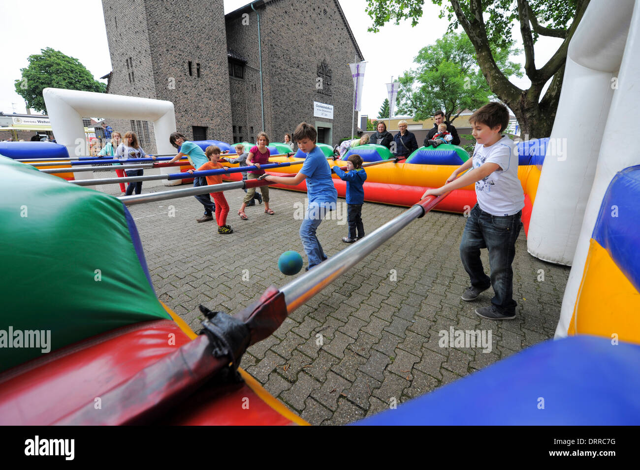 Children play human soccer a.k.a. giant football Stock Photo - Alamy
