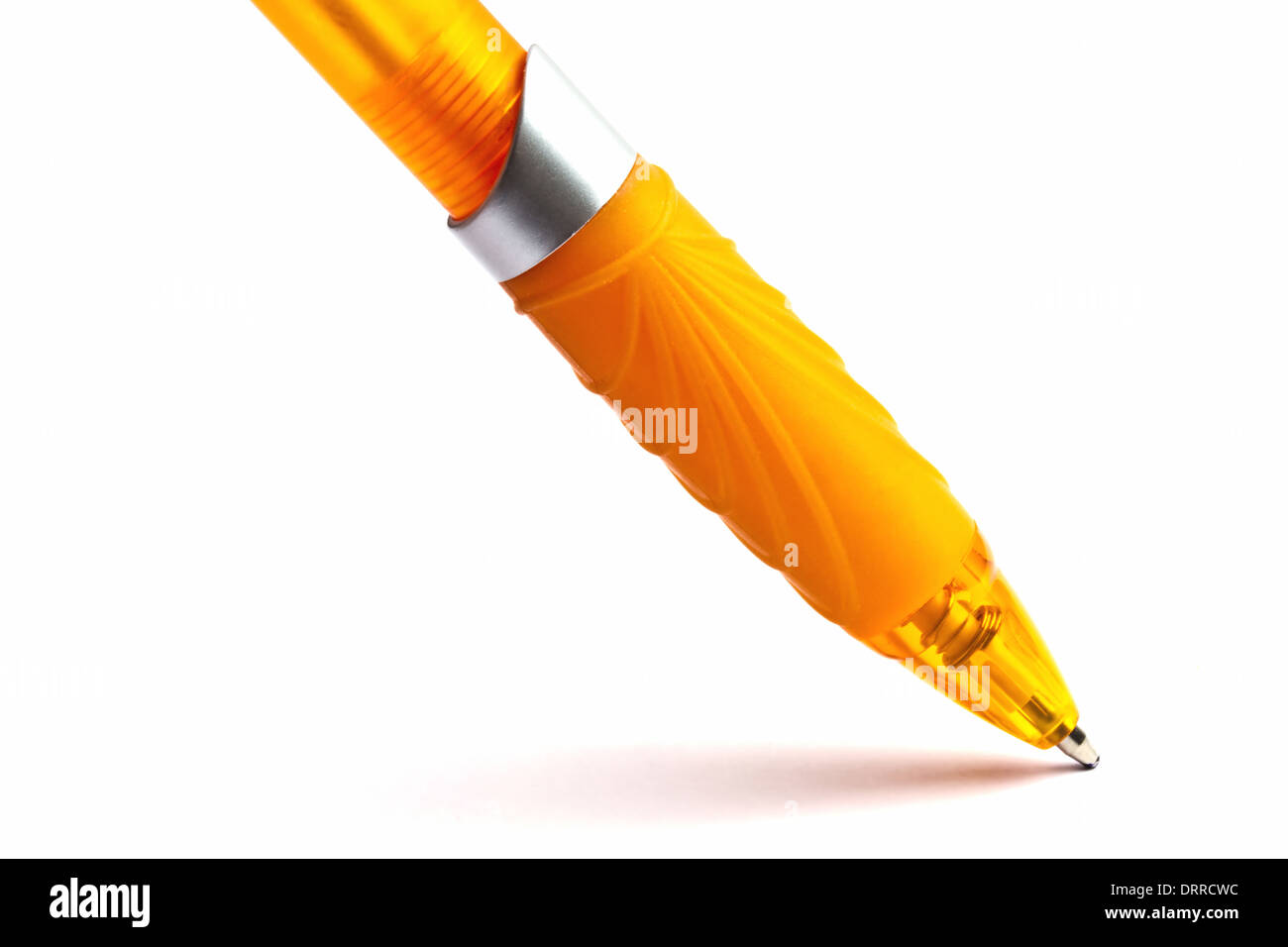 Yellow pen closeup on white Stock Photo - Alamy
