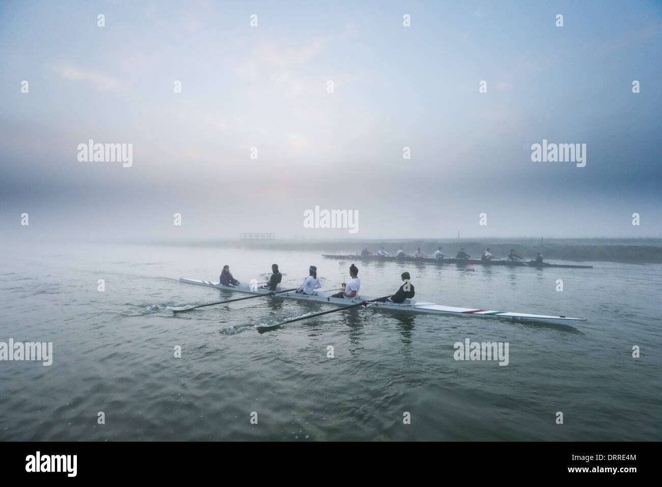 CAMBRIDGE UNIVERSITY STUDENT ROWERS ON THE RIVER CAM IN THE EARLY ...