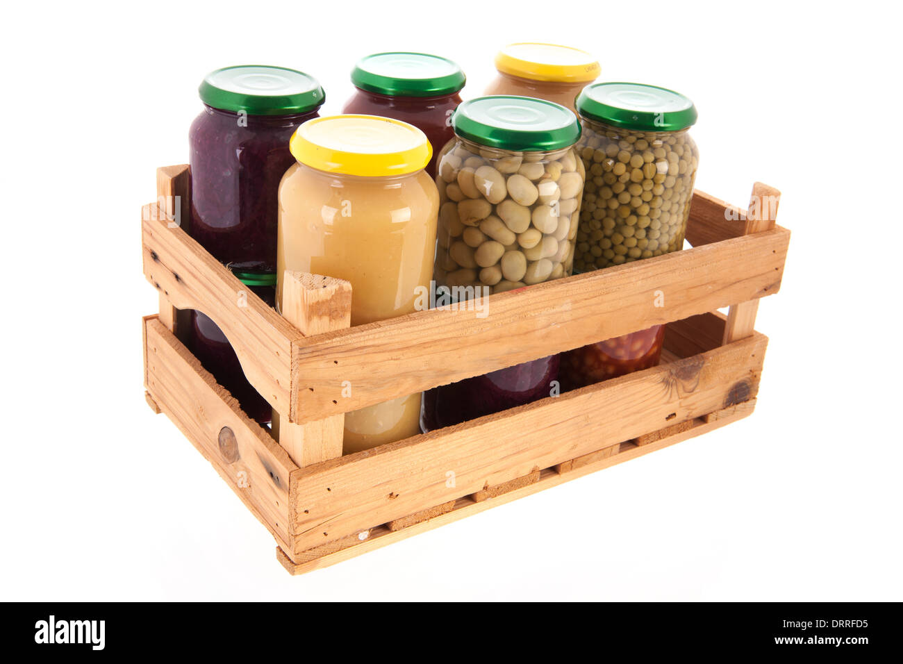 Wooden crate full with glass pots preserved vegetables Stock Photo - Alamy