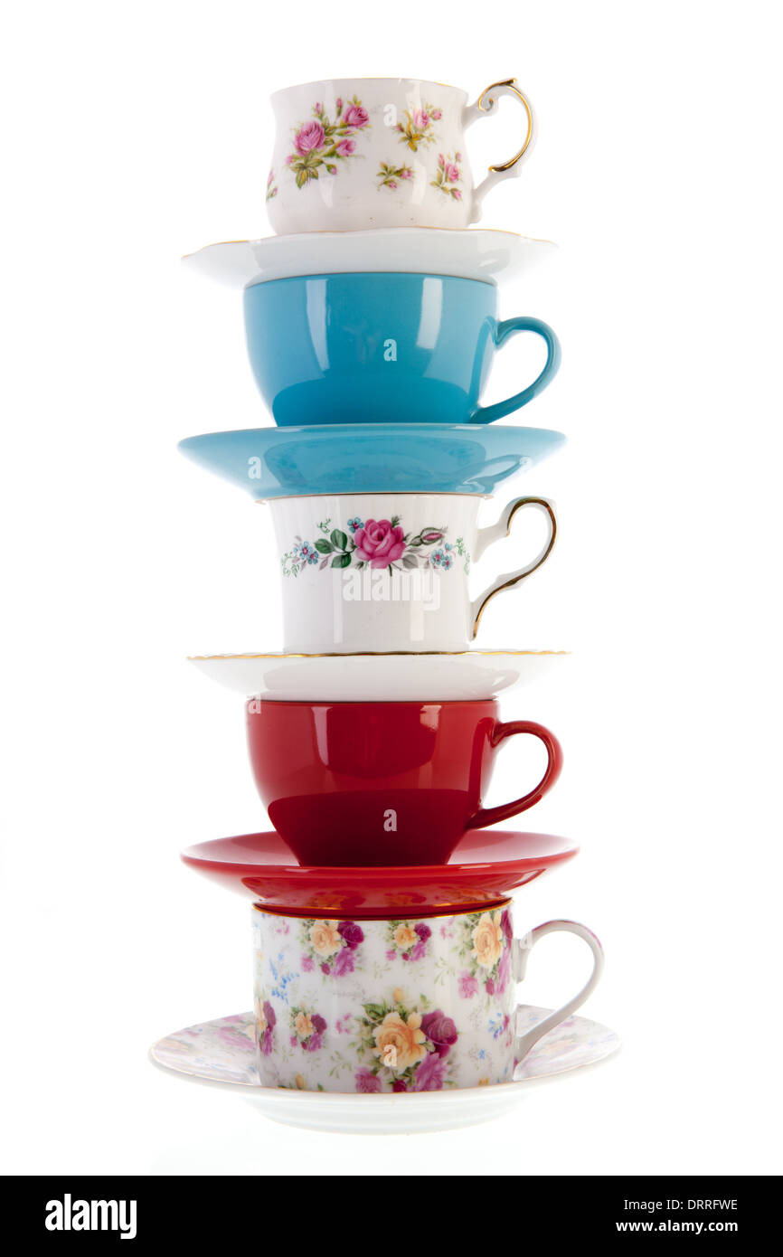 stacked vintage coffee or tea cups isolated over white background Stock ...