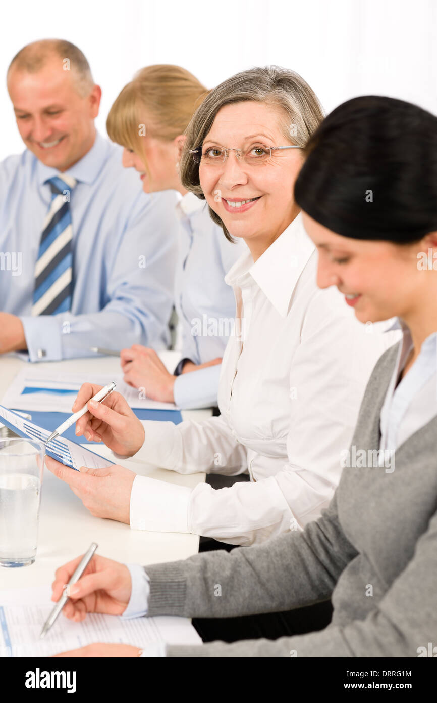 Business team meeting executive senior woman Stock Photo - Alamy