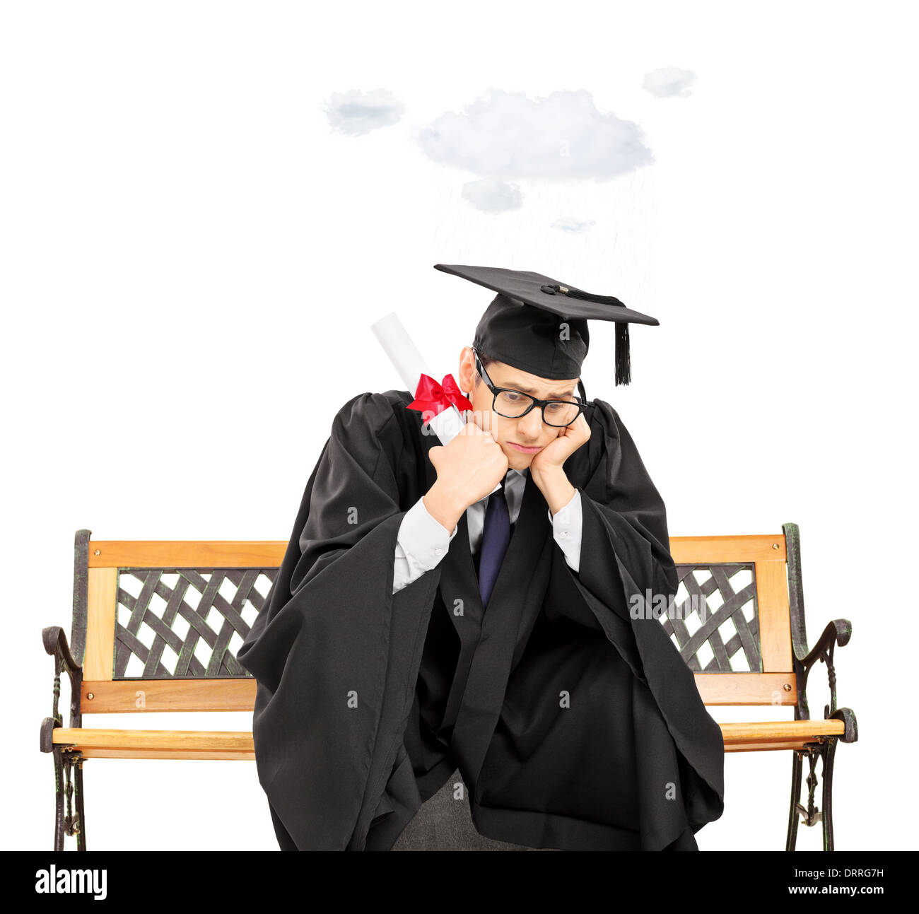Sad college graduate holding diploma hi-res stock photography and ...