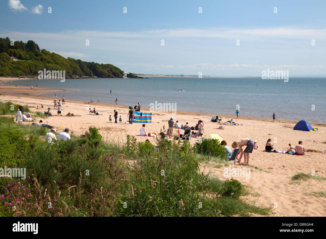 Sandyhills beach with holidaymakers enjoying the sunshine, Dumfries ...