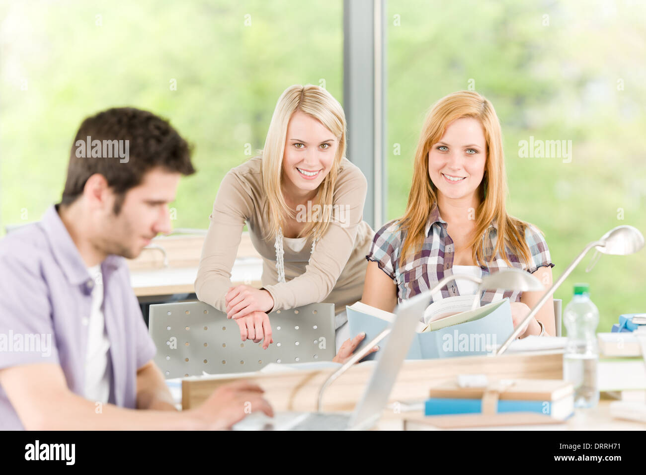 Group of young high school students learning Stock Photo - Alamy
