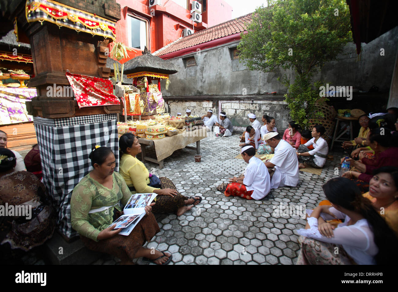 A ceremony at a Balinese Hindu temple/shrine. Bali - Indonesia Stock ...