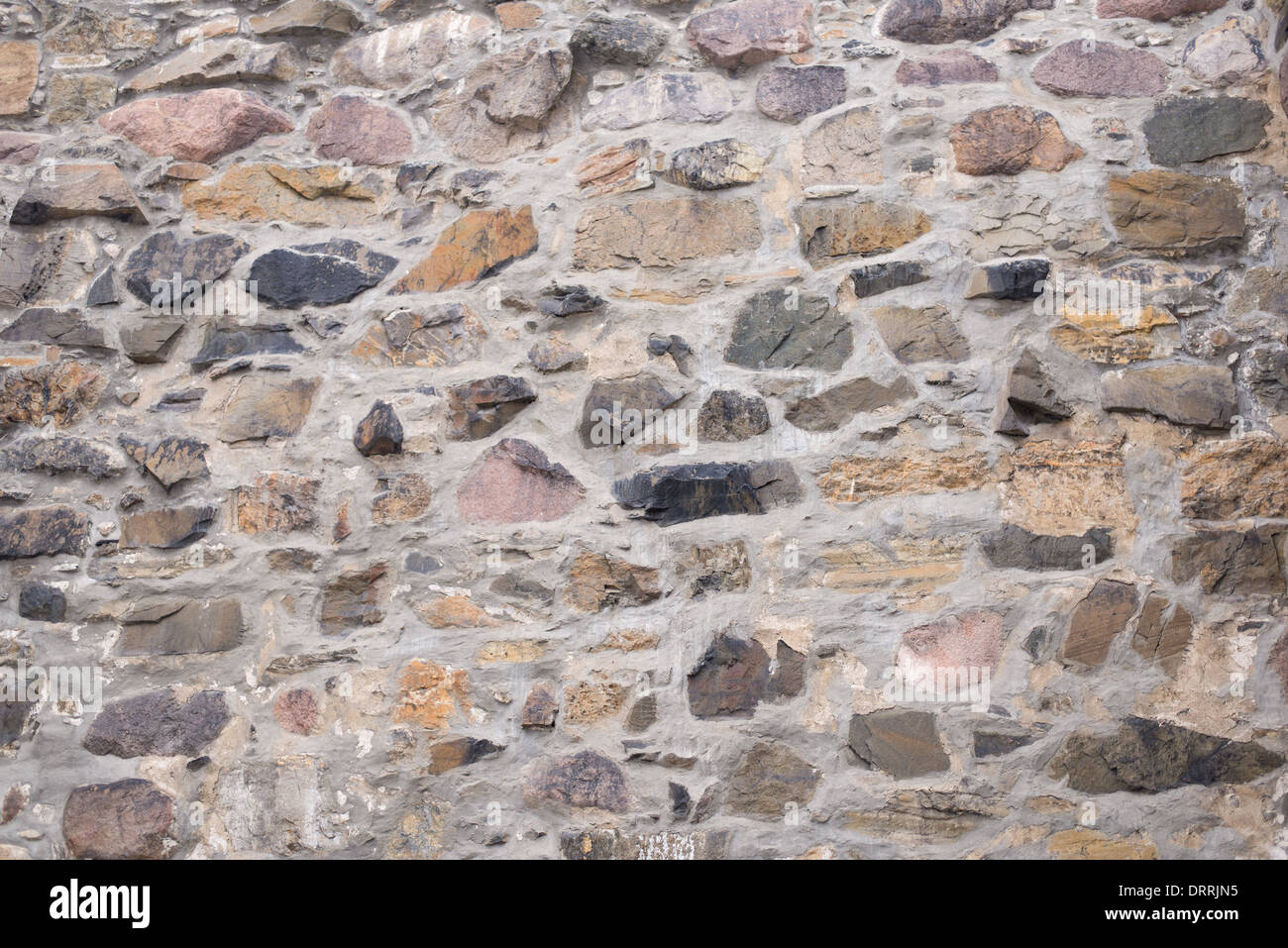 Old field stone wall background with stones of different colors Stock ...