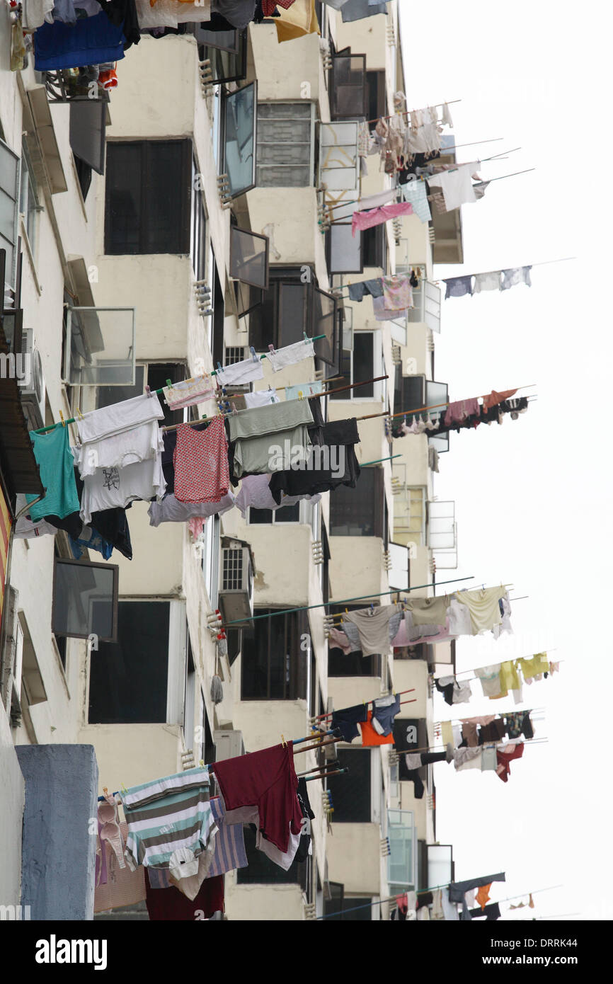 In Singapore, people dry their laundry using poles that stick out from ...