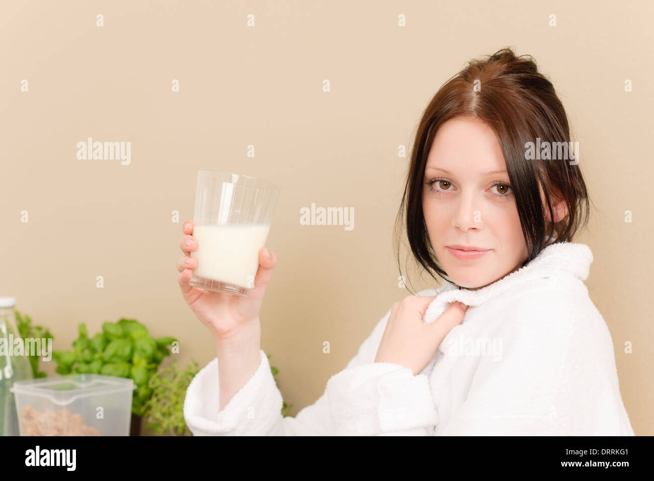 Young student girl drink milk for breakfast Stock Photo - Alamy