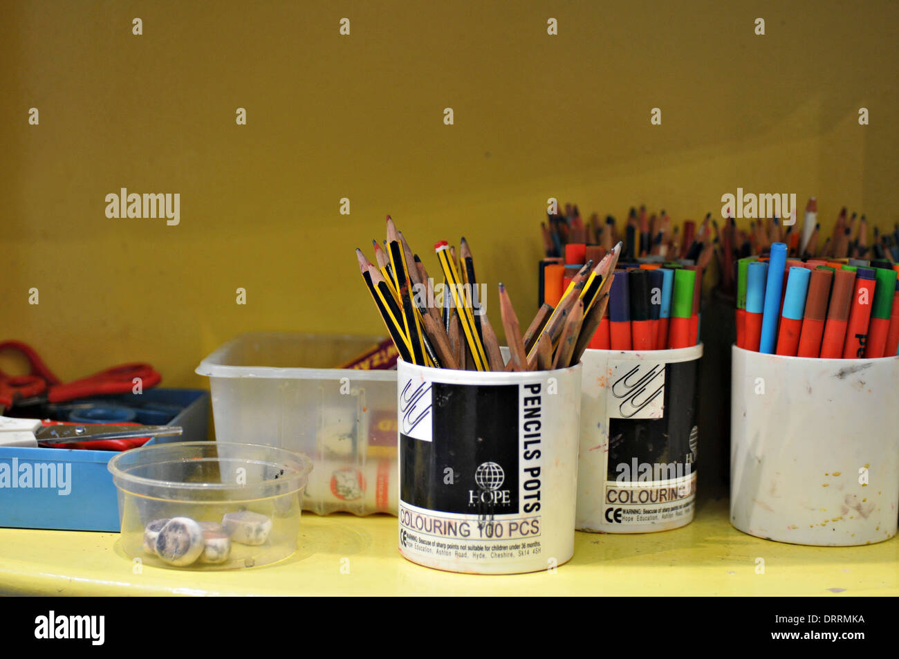 School Art room paint pencils pencil brushes Stock Photo - Alamy