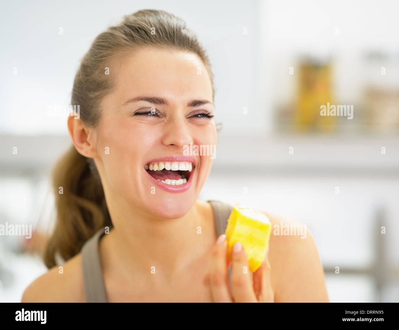 Woman young pineapple eat hi-res stock photography and images - Alamy