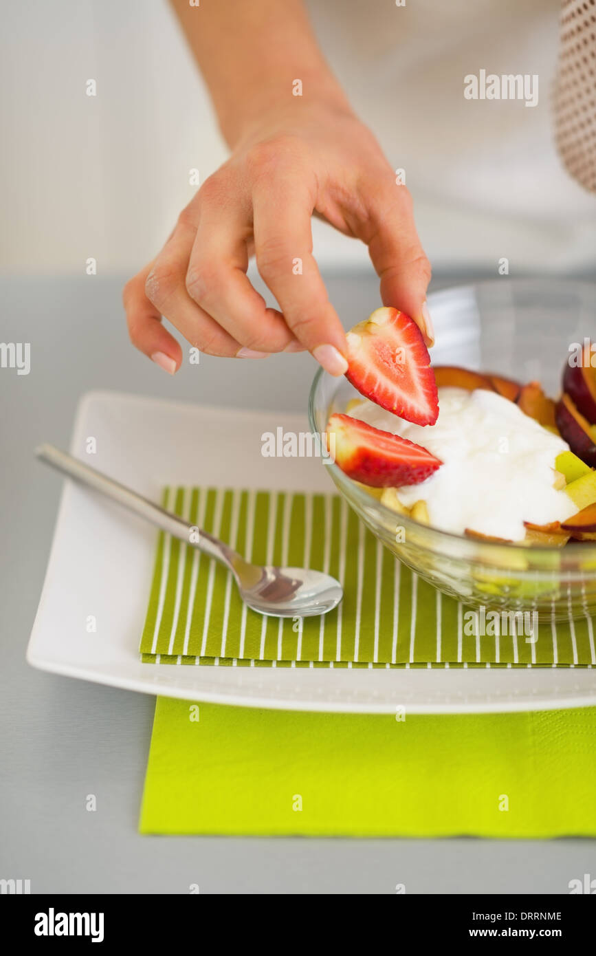 Woman serving fruit hi-res stock photography and images - Alamy