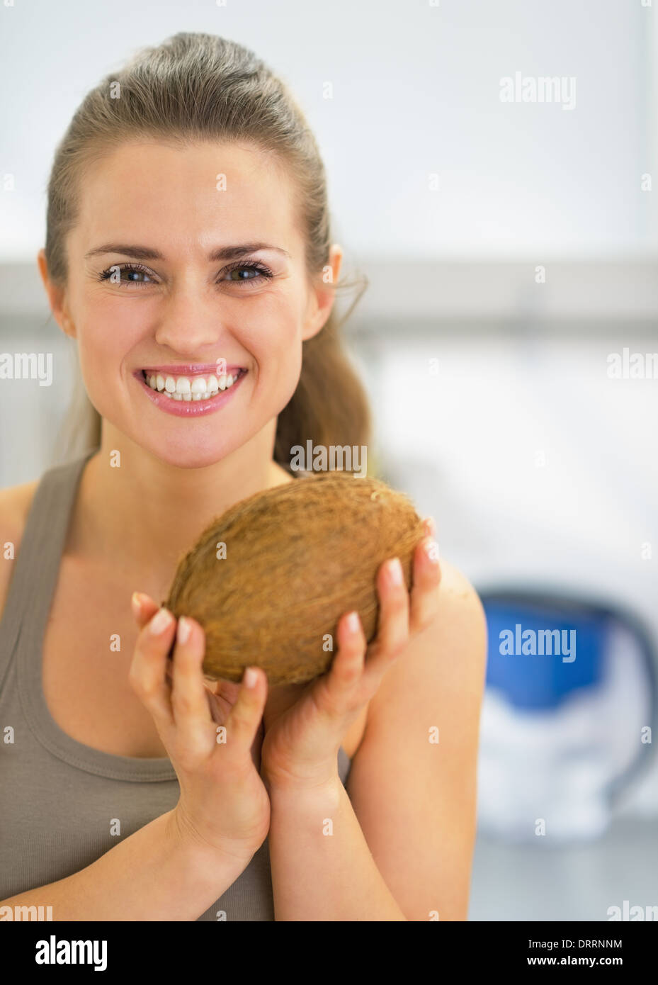 Woman eating coconut hi-res stock photography and images - Alamy