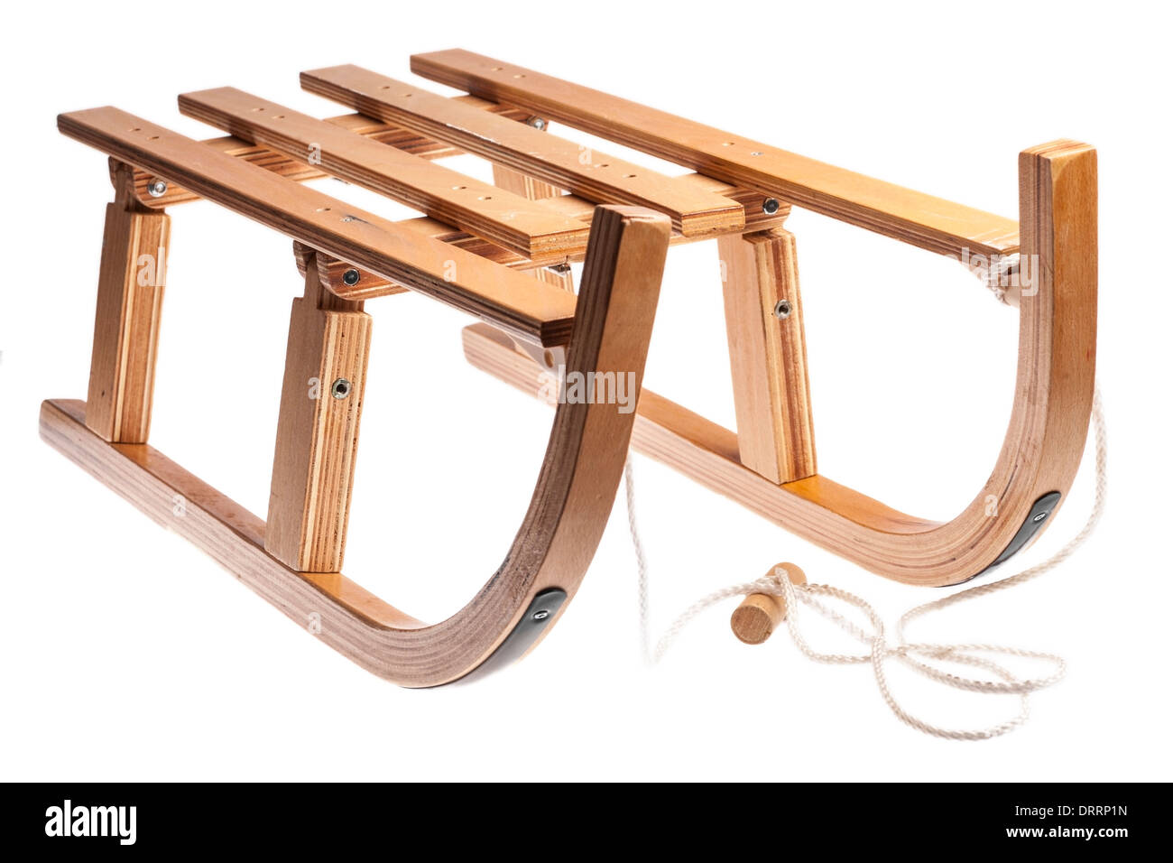 Color picture of a wooden sledge isolated on white Stock Photo - Alamy
