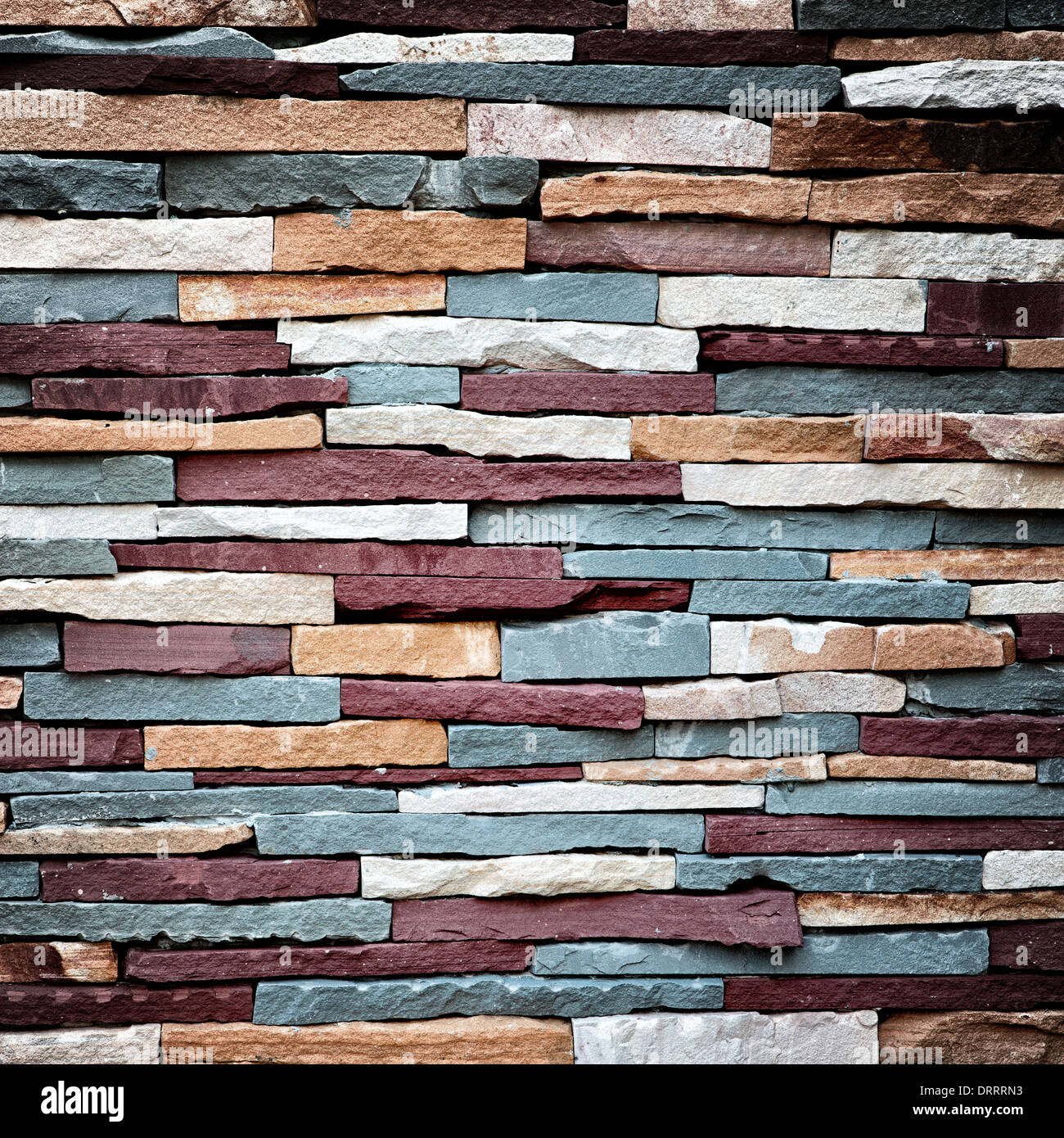 colorful stone wall texture Stock Photo - Alamy