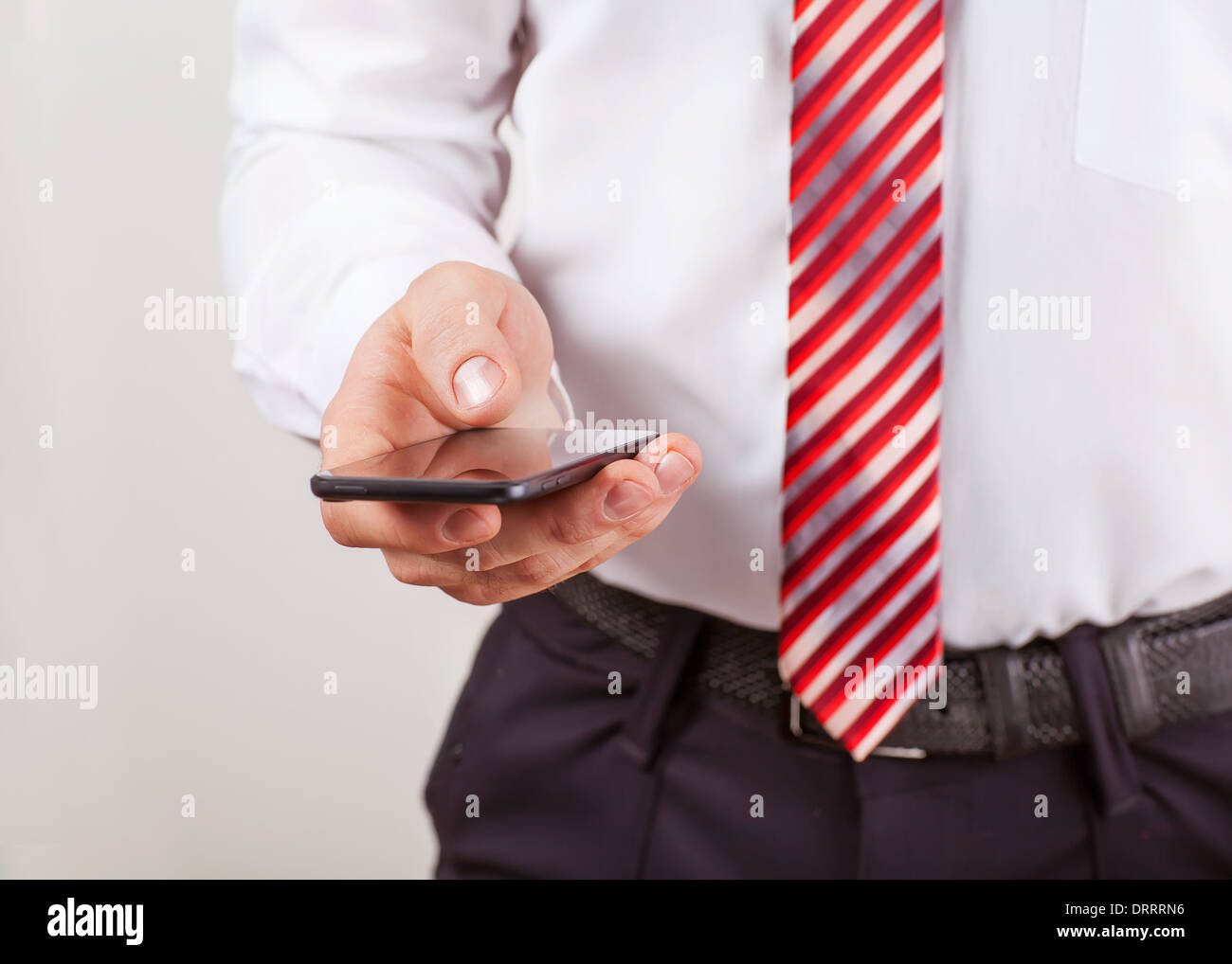 Touch screen mobile phone, in hand Stock Photo - Alamy