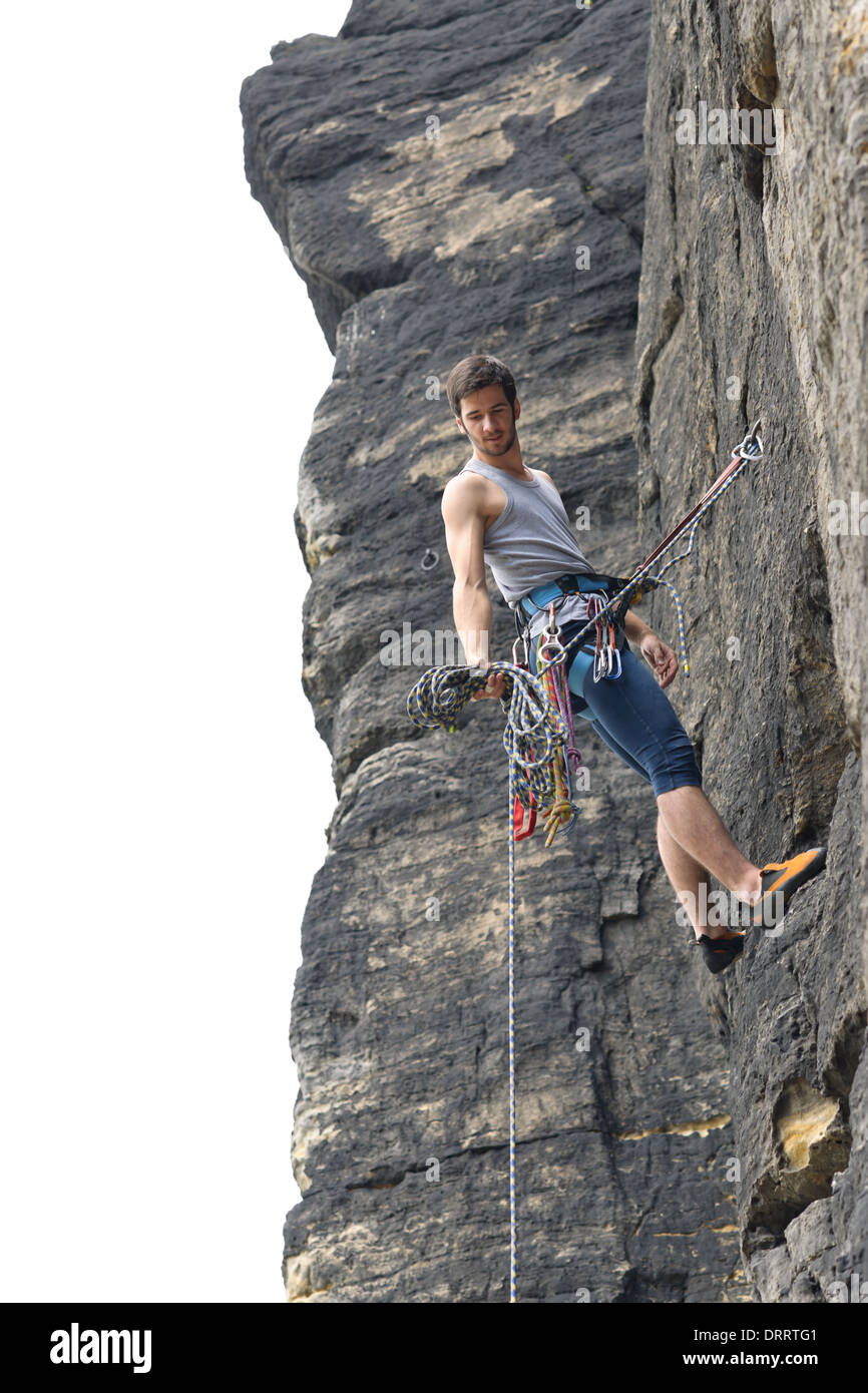 Man climbing on rock hi-res stock photography and images - Alamy