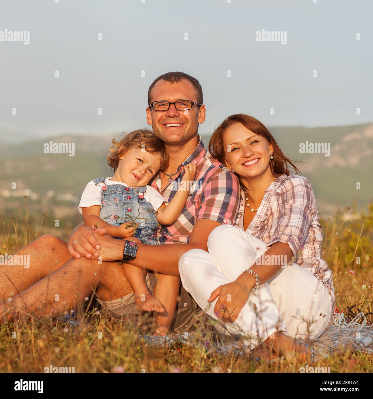 Mother father playing cheerful hi-res stock photography and images - Alamy
