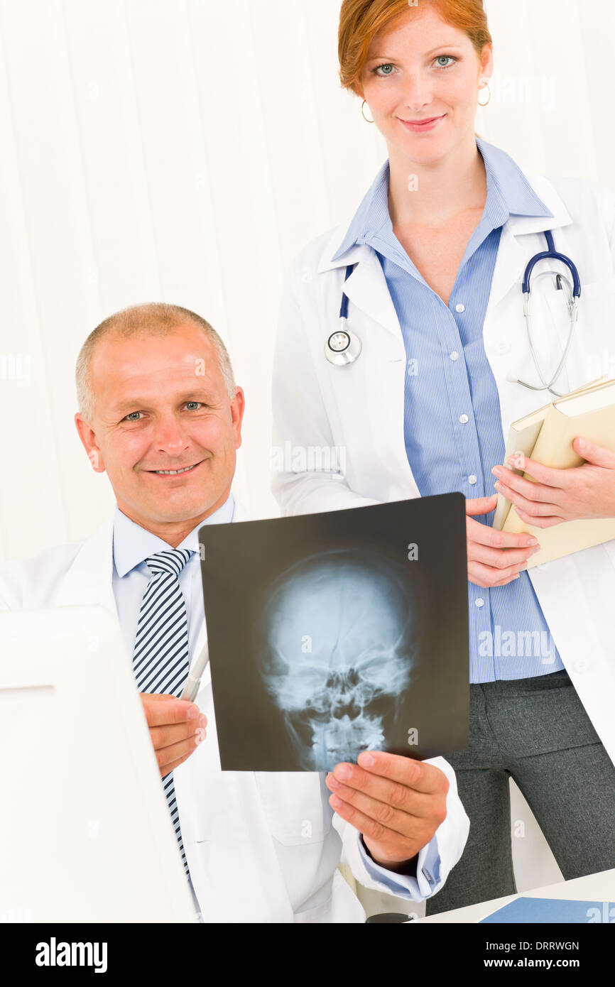 Medical doctor team male hold head x-ray Stock Photo - Alamy